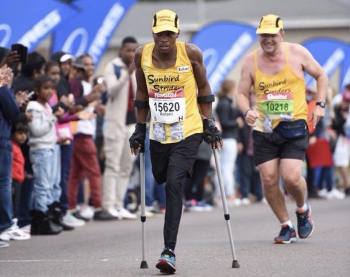 Amputee Runner Completes Comrades Marathon with Crutches - THISABILITY ...